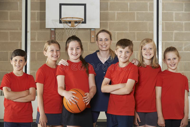 Teacher Taking Exercise Class in School Gym Stock Image - Image of ...