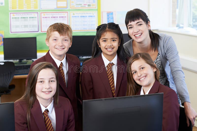 Portrait of Elementary School Pupils with Teacher in Computer Cl Stock ...