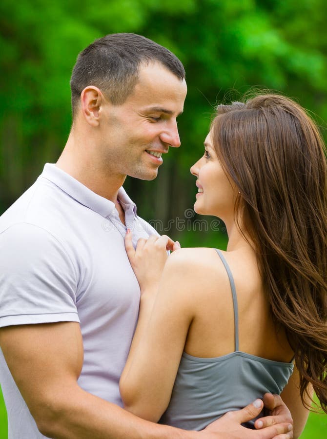 Portrait of Embracing Pretty Couple Stock Photo - Image of brunette ...