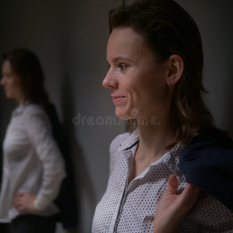 Portrait of an Emotional Business Woman Taking Off Her Jacket, Smiling ... Portrait of an Emotional Business Woman Taking Off Her Jacket, Smiling ...