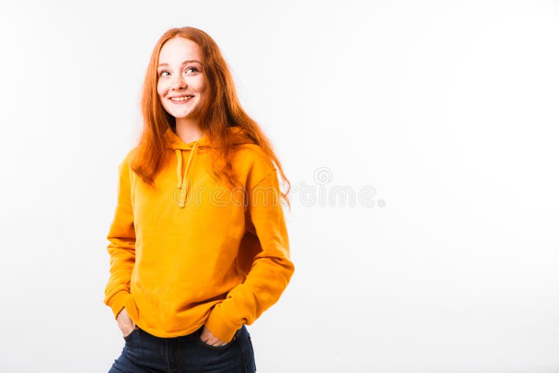 Portrait Of An Emotional Red Haired Girl With Freckles And Braces On A