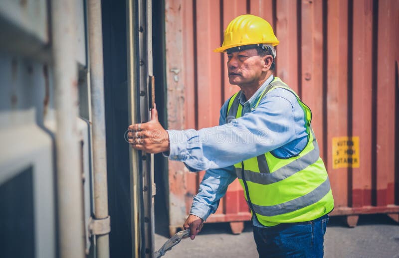 Portrait of Engineer or Foreman Wears PPE Checking Container Storage ...