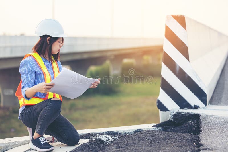 Portrait of Engineer Gesturing Over Damaged Road, Road Workers ...