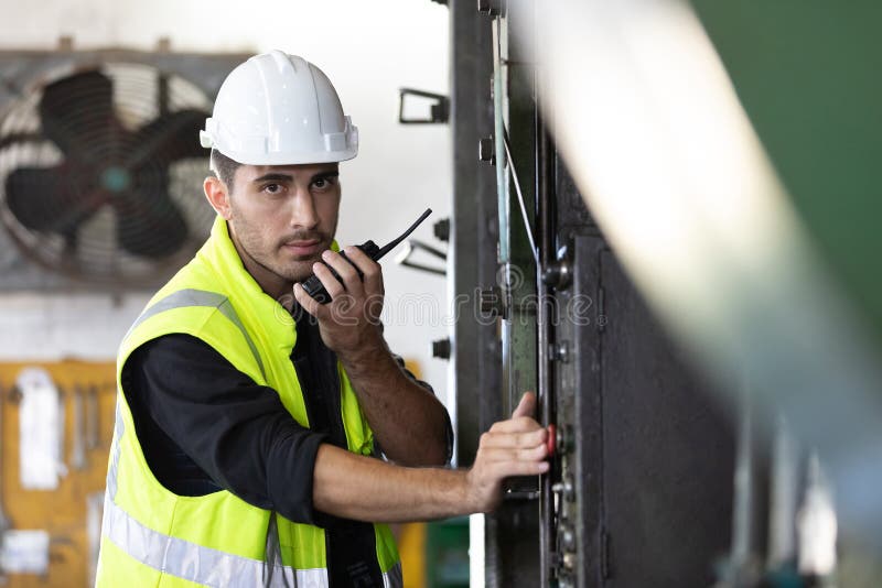 Engineer Man or Worker Pushing Button on Machine and Controlling ...