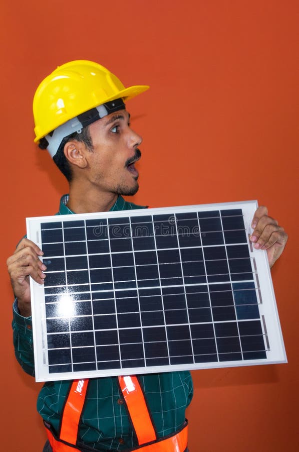 Portrait of an Engineer or Solar Worker in Protective Work Clothes ...