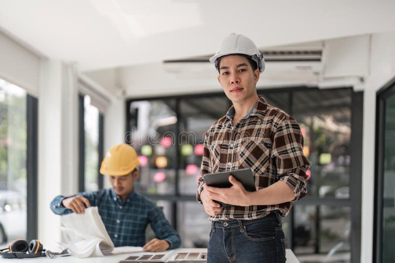 Portrait of Engineer with Tablet in Creative Office. Contractor Holding ...