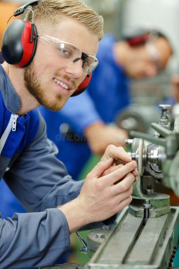 Portrait Engineer Using Machinery and Wearing Goggles Stock Image ...