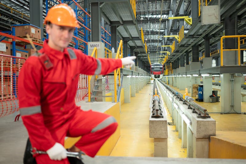 Portrait of Engineer Using Repair Tools of the Electric Train Industry ...