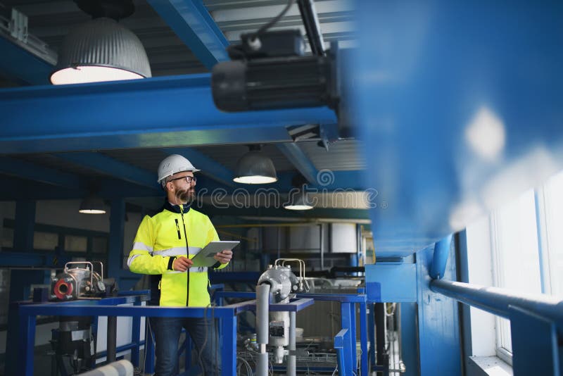 Portrait of Engineer Working in Industrial Factory Stock Photo - Image ...