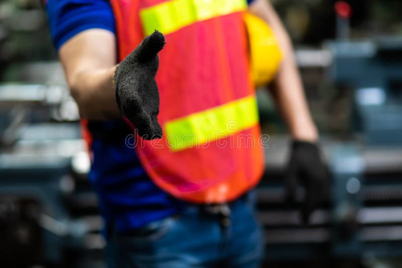 Portrait Engineering Man Giving Handshake at Machine for Steel ...