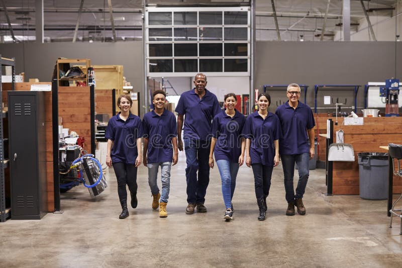 Portrait of Engineers and Apprentices in Busy Factory Stock Image ...