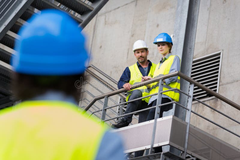 Portrait Engineers Discussing Outdoors Stock Photo - Image of foreman ...