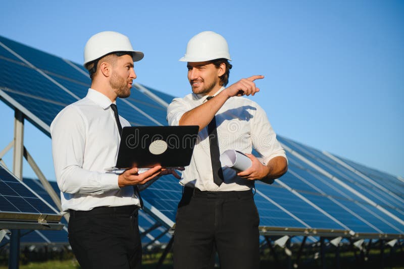 Portrait of Engineers Standing Outside Near Solar Panels Stock Image ...