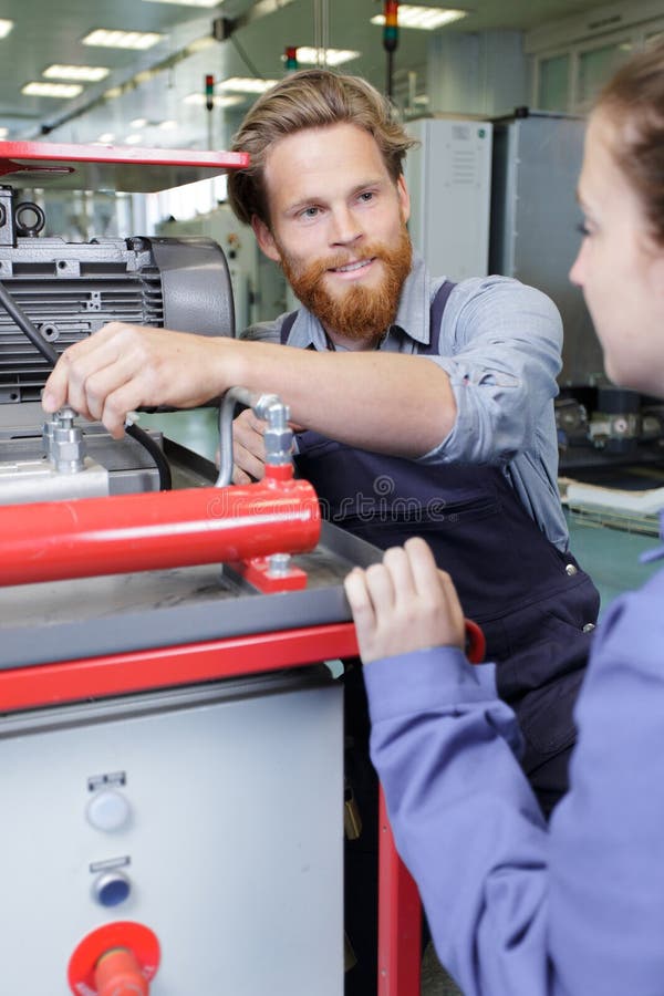 Portrait Engineers Using Cad Programming Software On Machine Stock Image Image Of Twenties