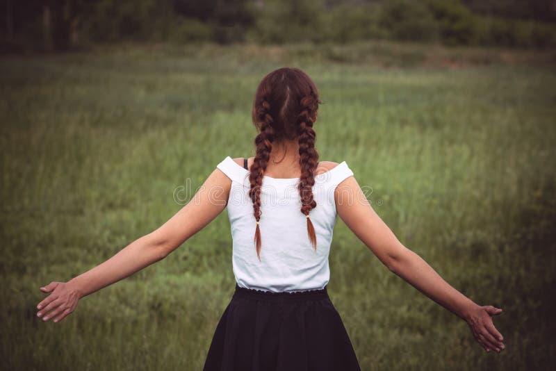 Happy Beautiful Young Woman Raising Her Hands In The Forest Enjoying ... Happy Beautiful Young Woman Raising Her Hands In The Forest Enjoying ...