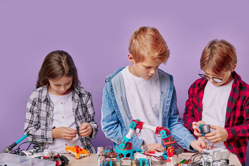 Enthusiastic Concerned Children Assembling Tech Robots, Future ...