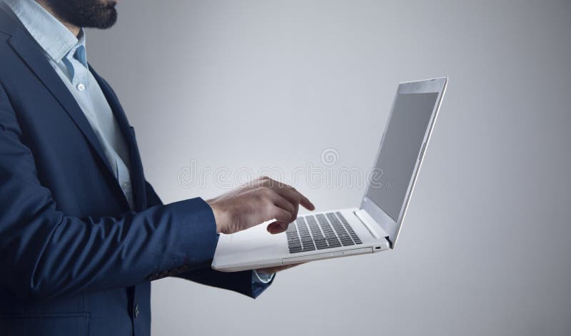 Excited Man Holding Laptop Computer Stock Image - Image of male ...