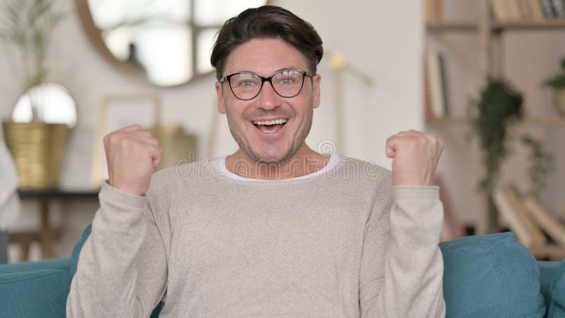 Portrait of Excited Middle Aged Man Celebrating at Home Stock Image ...