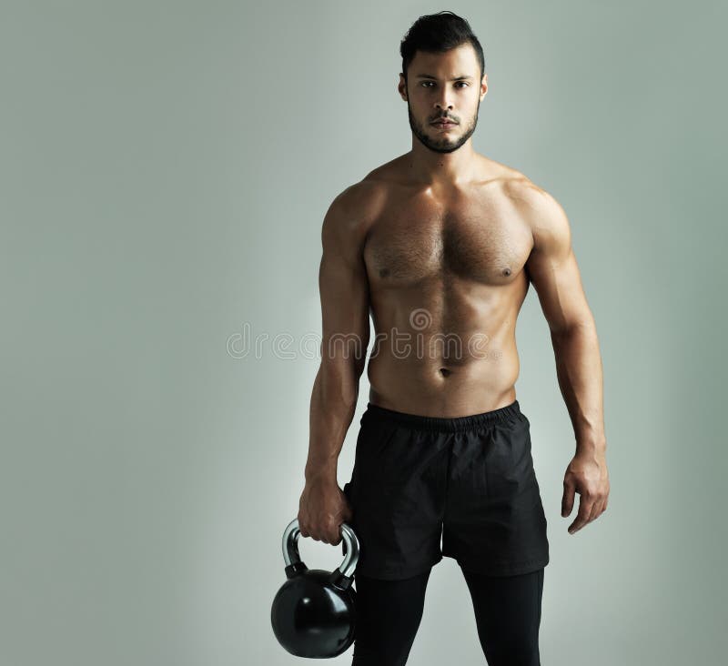 Portrait, Exercise and Man with Kettlebell in Studio for Muscle ...