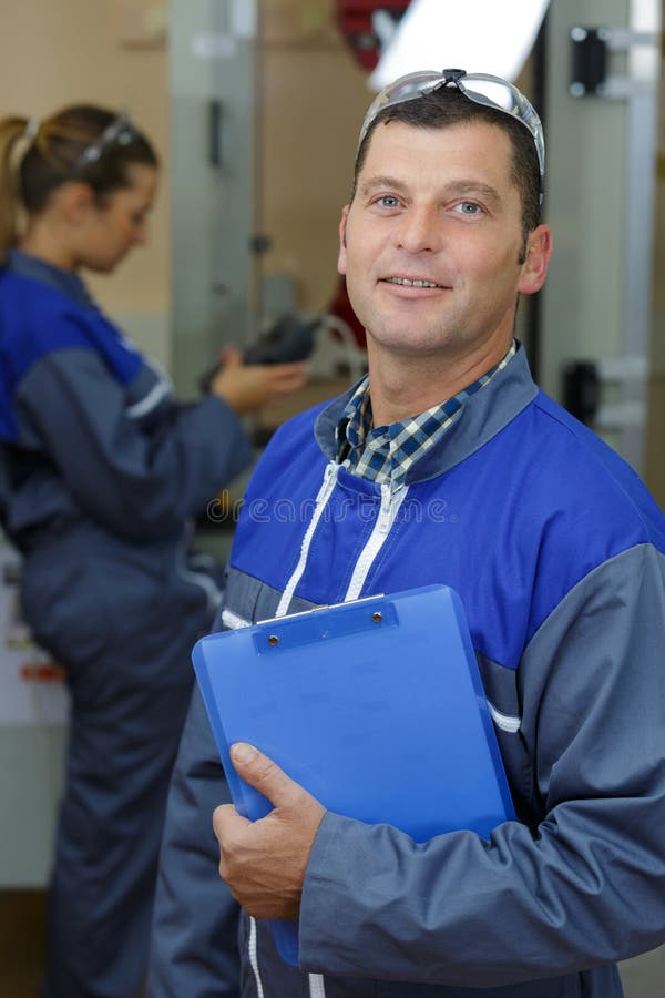 Portrait Factory Worker in Component Store Stock Photo - Image of ...