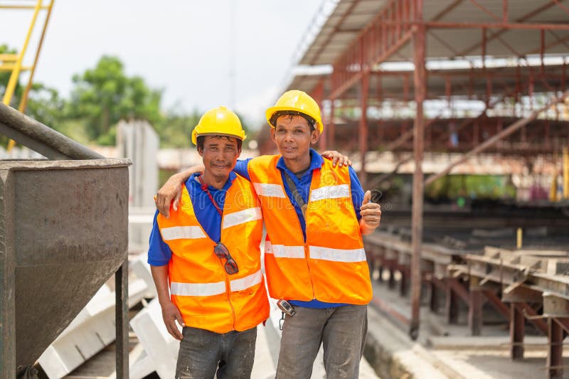 Portrait of Factory Worker Man Team in Hard Hat at the Precast Factory ...