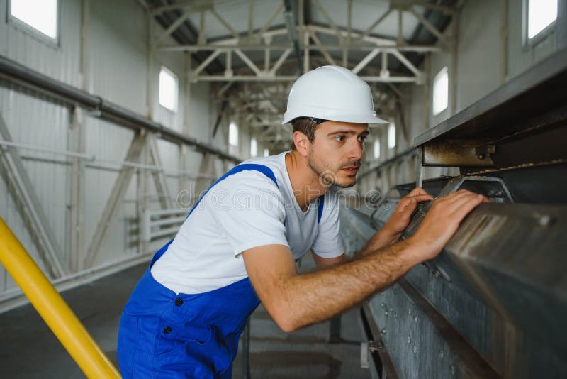 Factory Worker. Man Working on the Production Line Stock Photo - Image ...