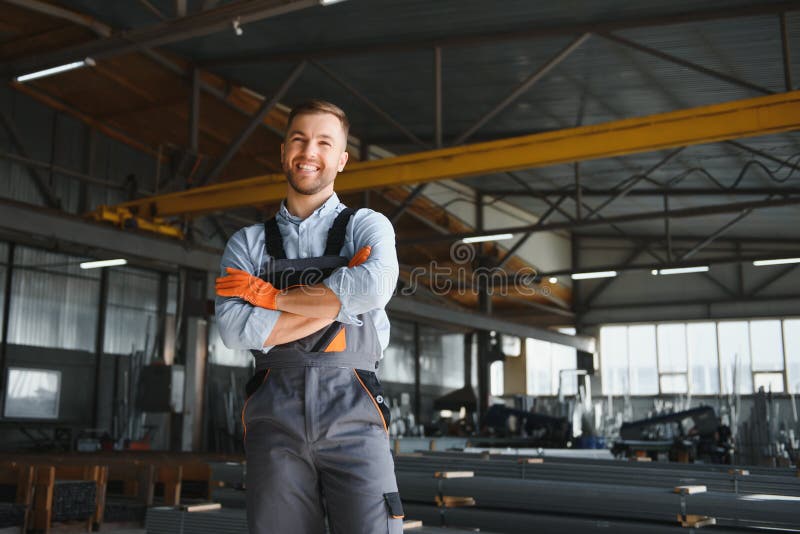 Portrait of Factory Worker. Young Handsome Factory Worker. Stock Photo ...