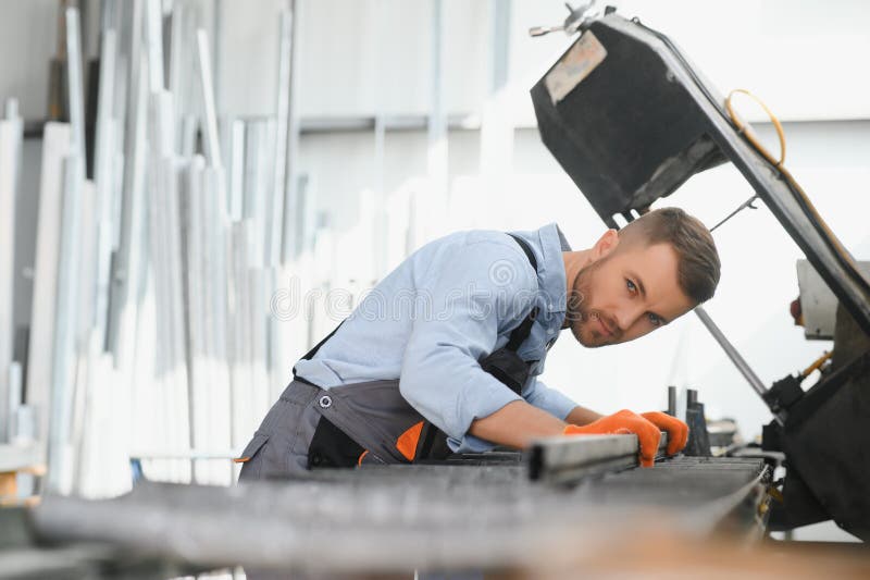 Portrait of Factory Worker. Young Handsome Factory Worker. Stock Photo ...