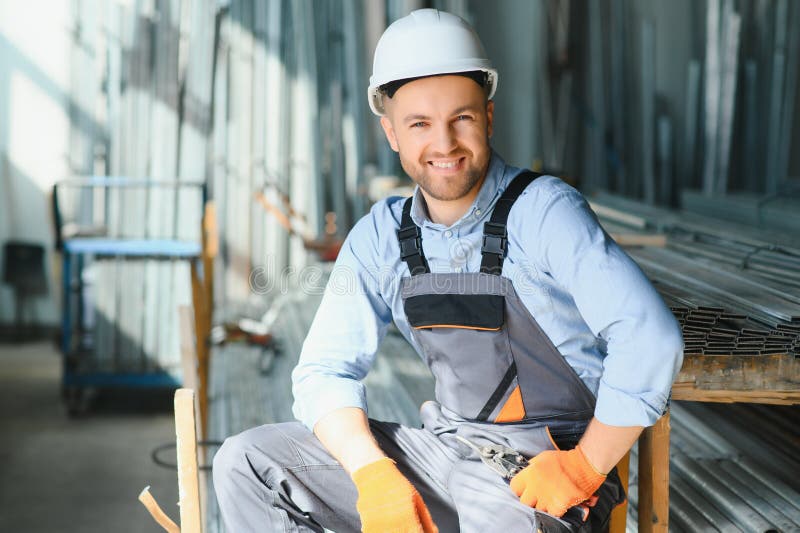 Portrait of Factory Worker. Young Handsome Factory Worker. Stock Photo ...
