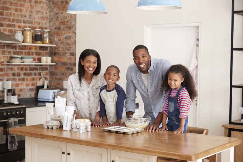 Portrait of Family Baking Cakes in Kitchen Together Stock Photo - Image ...