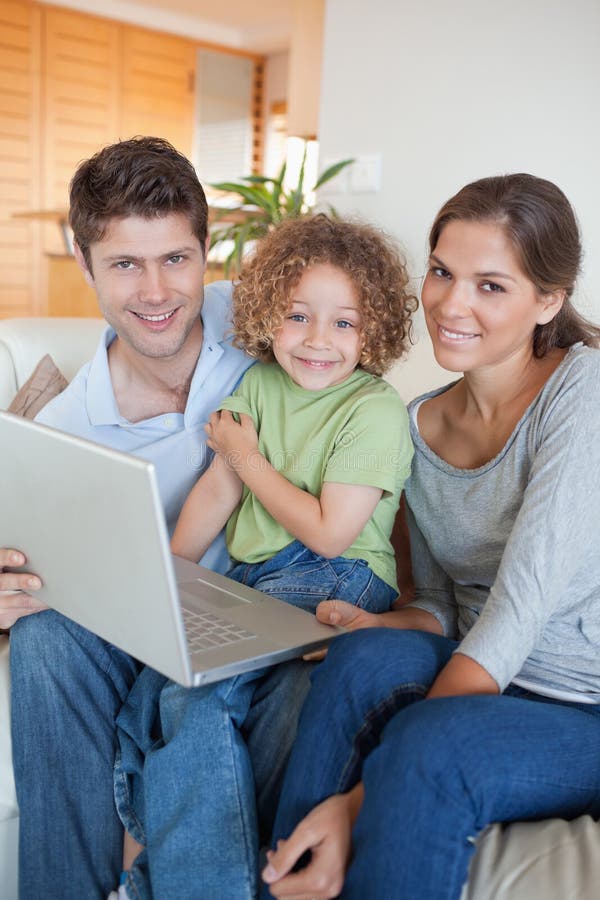 Portrait of a Family Using a Laptop Stock Image - Image of leisure ...