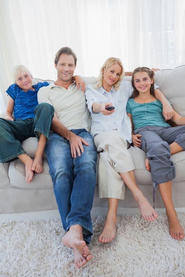 Portrait of a Family Watching Television Stock Photo - Image of ...