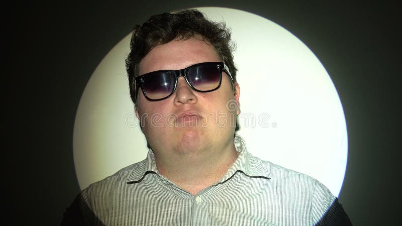 Portrait of a Fat Man in a Multicolored Light Beam. Stock Video - Video ...