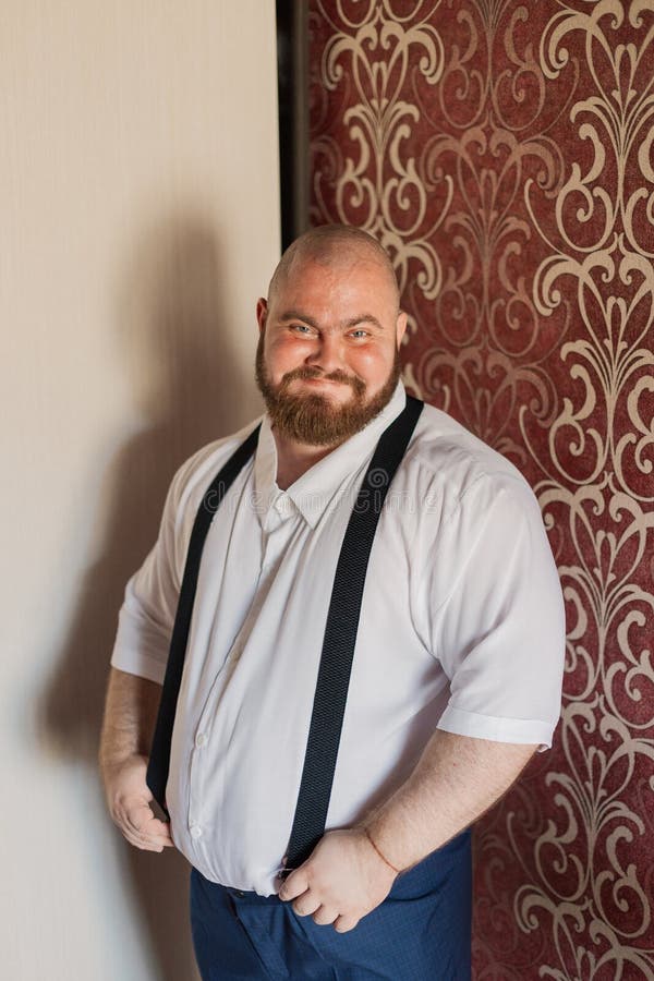 Portrait of a Fat Man with Suspenders on His Pants. Stock Image - Image ...