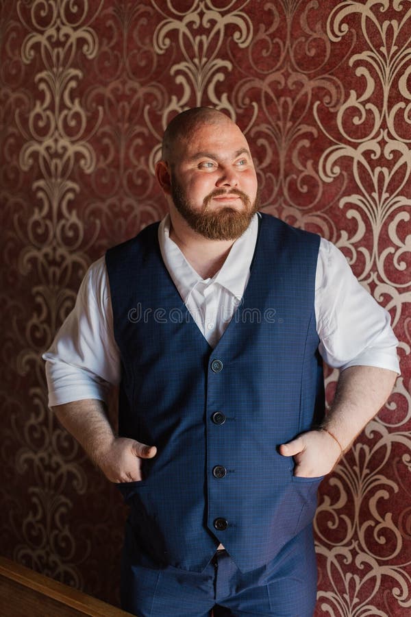 Portrait of a Fat Man with Suspenders on His Pants. Stock Photo - Image ...