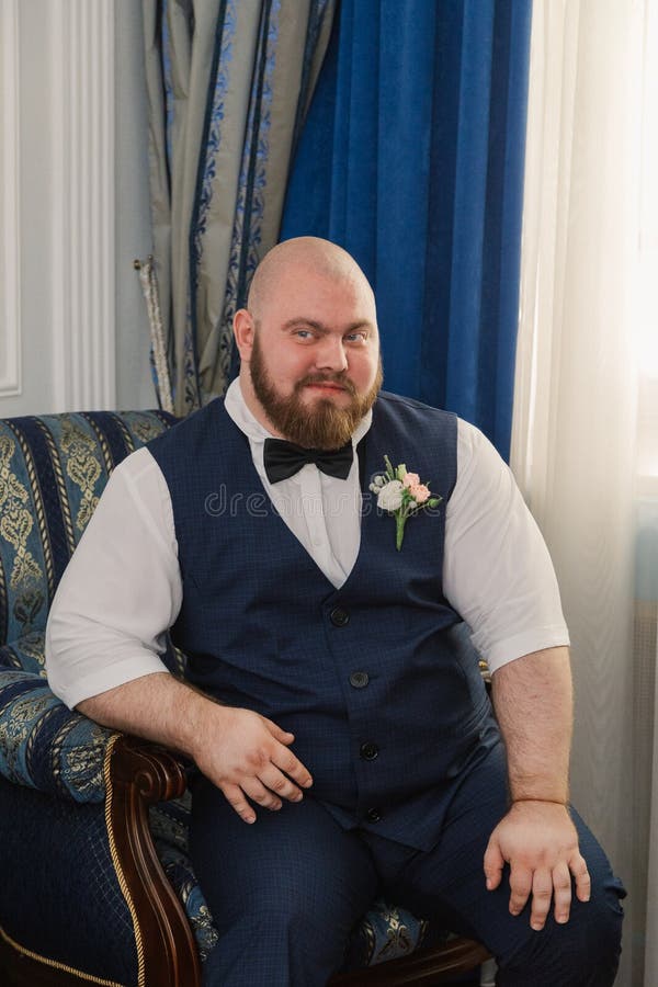 Portrait of a Fat Man with Suspenders on His Pants. Stock Photo - Image ...