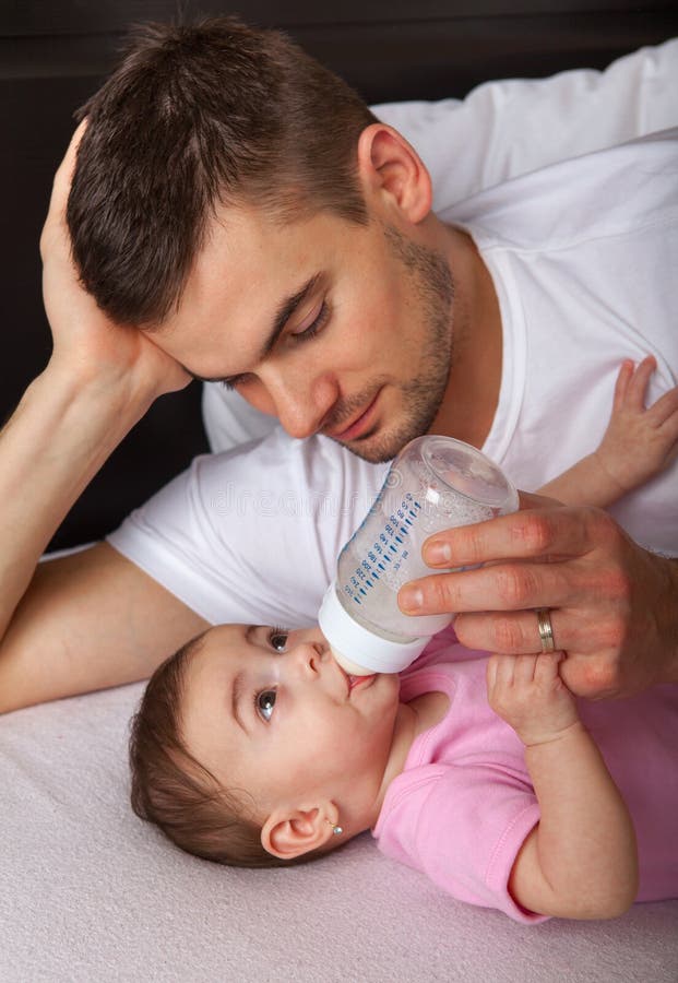 Portrait of Father Feeding Daughter Stock Image - Image of cute ...