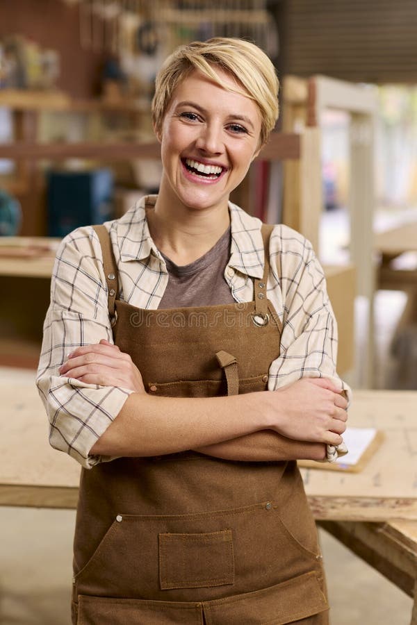Portrait of Female Apprentice Working As Carpenter in Furniture ...