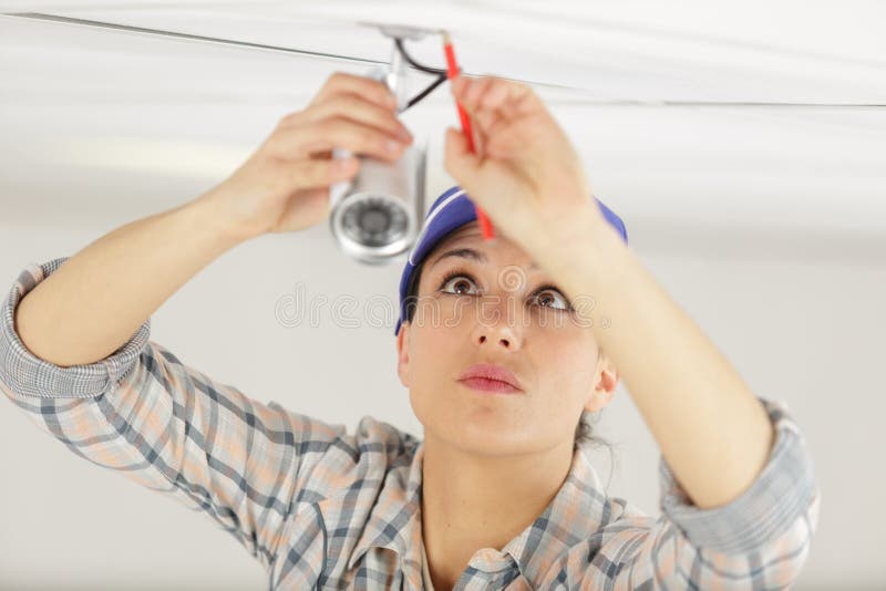 Portrait Female Cctv Installer Stock Photo - Image of cctv, safe: 254430642