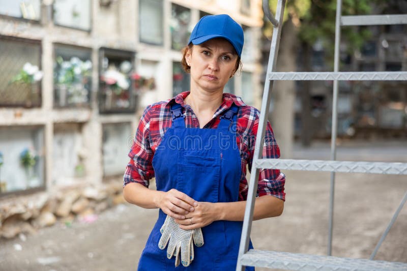 Portrait of Female Cemetery Worker in Overalls Stock Photo - Image of ...