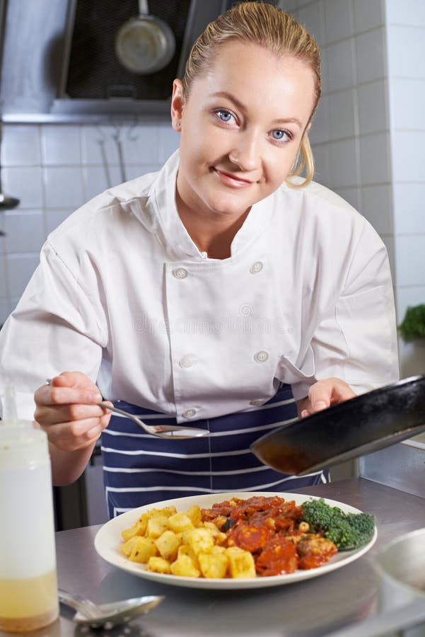 Portrait of Female Chef Working in Restaurant Kitchen Stock Photo ...