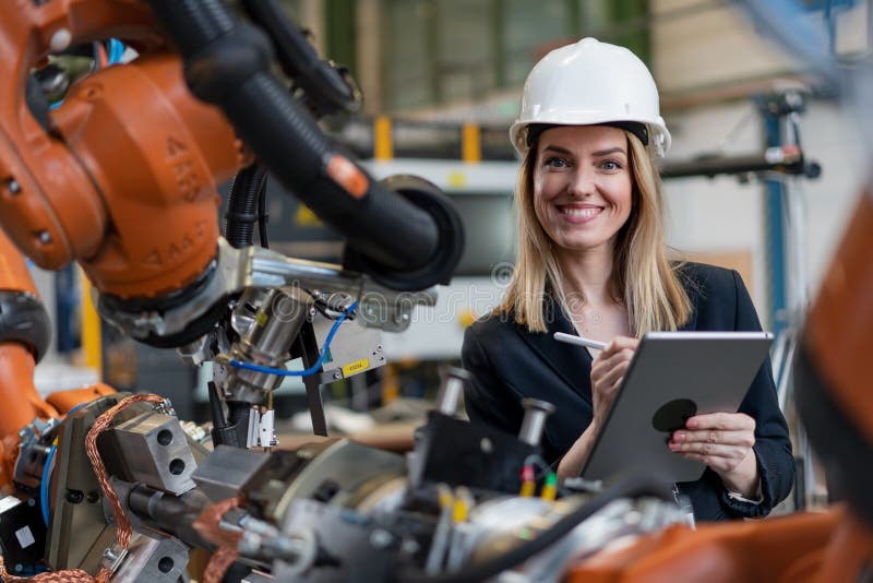 Portrait of Female Chief Engineer in Modern Industrial Factory Using ...