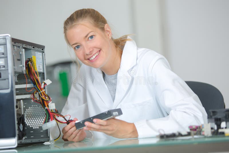 Portrait Female Computer Technician Stock Photo - Image of component ...