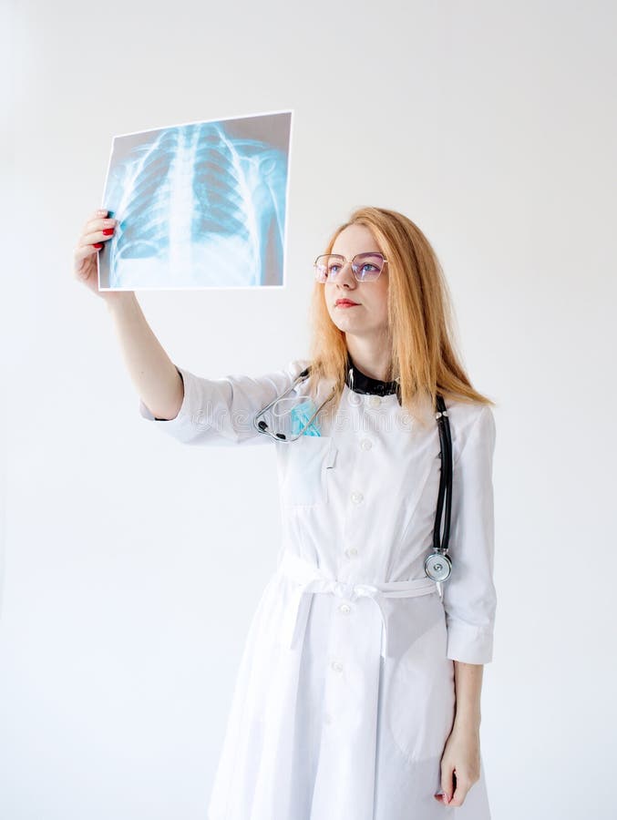 Portrait of a Female Doctor Looking at a Chest X-ray. Stock Photo ...