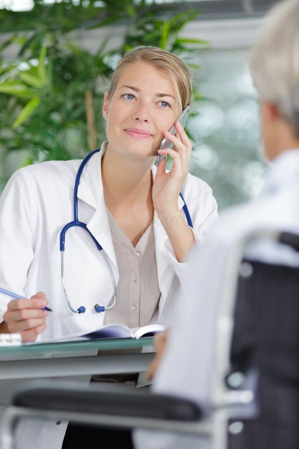 Portrait Female Doctor Using Mobile Phone Stock Image - Image of talk ...