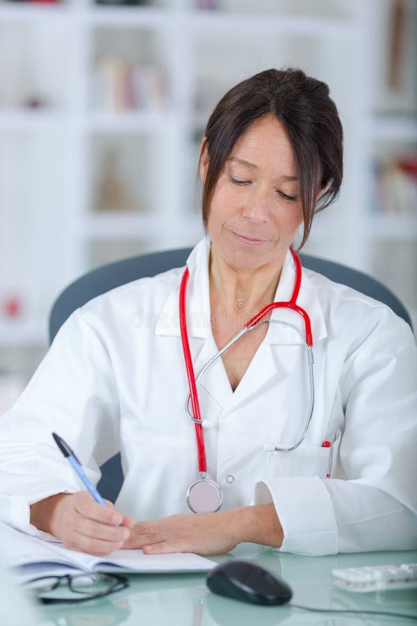 Portrait Female Doctor Writing Stock Photo - Image of doctor, notepad ...