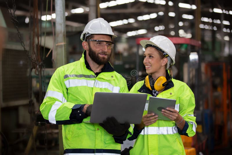 Portrait of Female Engineer Standing with Confident Against Machine ...
