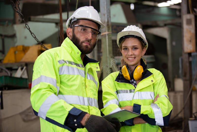 Portrait of Female Engineer Standing with Confident Against Machine ...