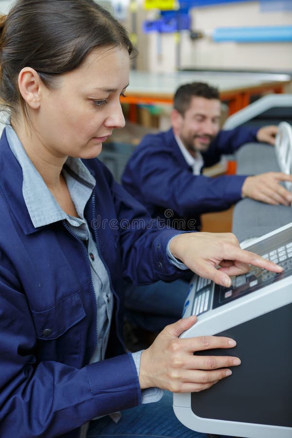 Portrait Female Factory Worker Operating Machine Stock Image - Image of ...