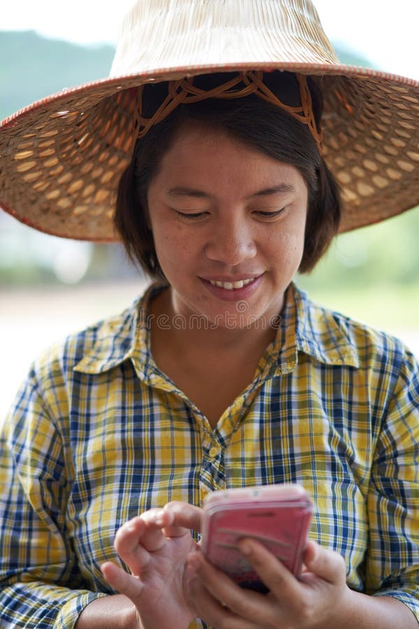 Portrait Female Farmer Using Smartphone in Blur Rice Field and M Stock ... Portrait Female Farmer Using Smartphone in Blur Rice Field and M Stock ...